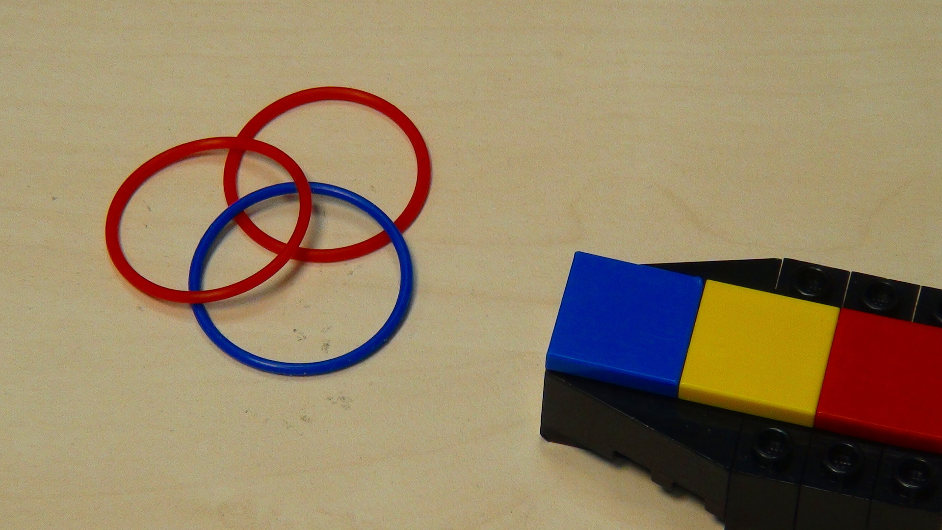 Rubber band LEGO attachment without motors | FLLCasts